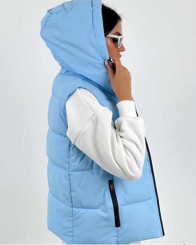 Жилетка з капюшоном — ціна 880 грн у каталозі Жилетки Купити жіночі речі за доступною ціною на