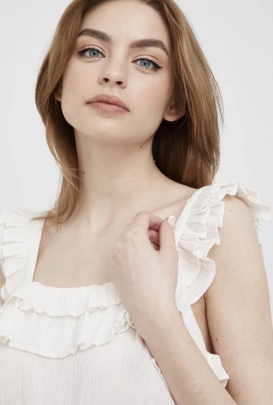 Молочна шовкова блуза з рюшами Love Moschino шелковая блуза с оборками шелковый топ — ціна 280