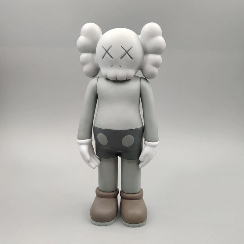 Статуэтка Kaws Companion серого цвета 18 см дизайнерская игрушка кавс серый фигурка для