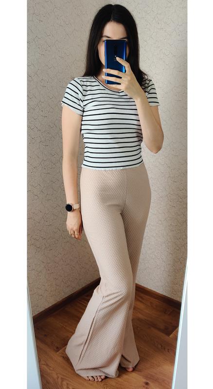 Ніжно рожеві штани кльош — ціна 200 грн у каталозі Брюки Купити жіночі речі за доступною ціною