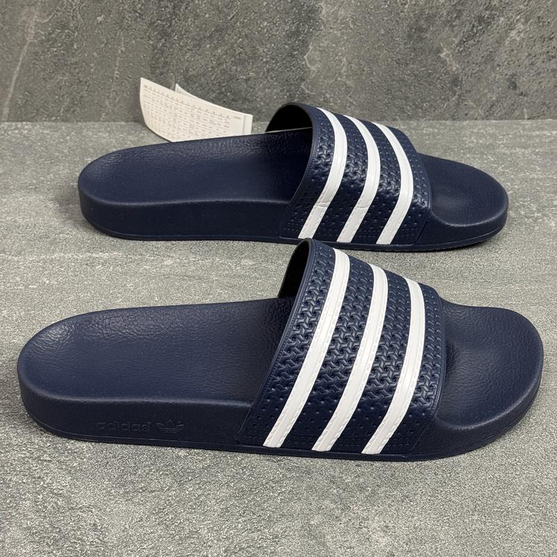 Синие тапочки шлепанцы adidas adilette 288022 — цена 999 грн в каталоге ...