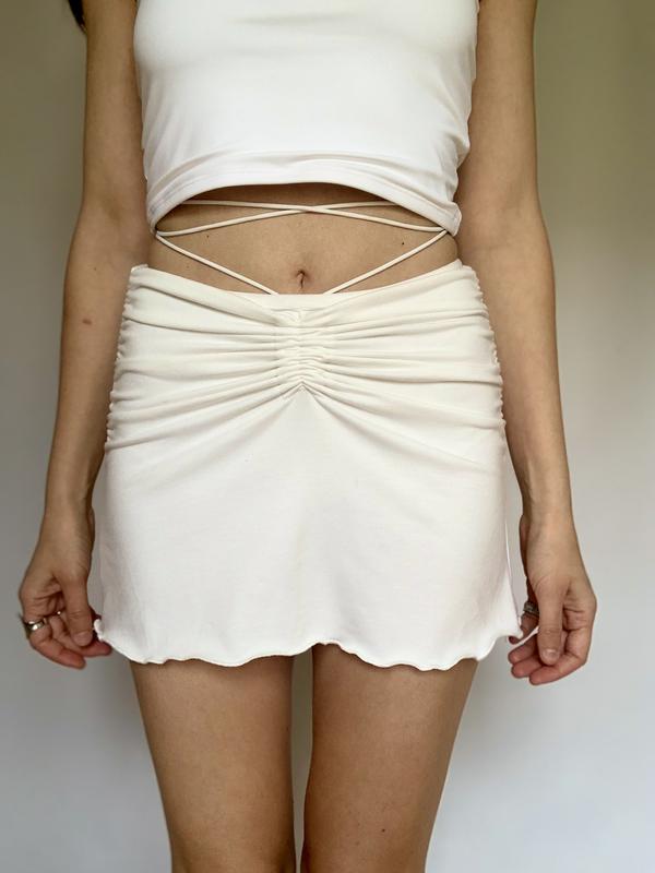 Біла спідниця з завязками — ціна 177 грн у каталозі Міні спідниці Купити жіночі речі за